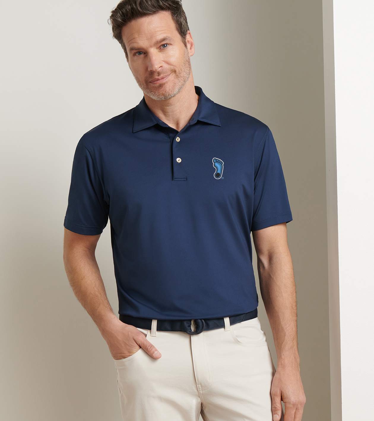UNC Tar Heels Solid Performance Jersey Polo | Men's Collegiate Apparel ...